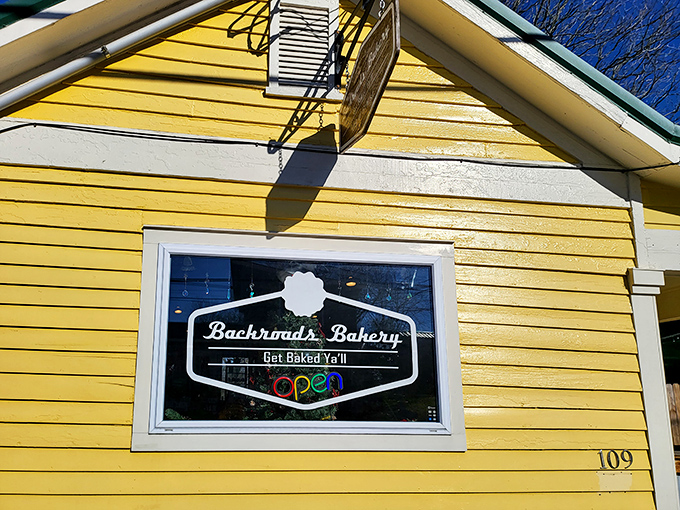 The cheerful yellow exterior with its bright red door isn't just inviting&mdash;it's practically shouting "Get in here and eat something delicious!" Small but mighty, this cottage houses some serious culinary magic.