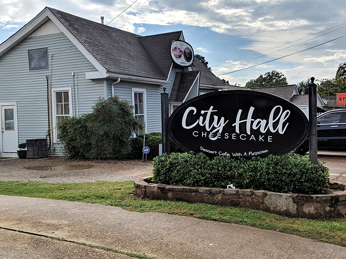 The charming blue cottage with wooden shutters practically whispers "come on in" &ndash; Mississippi's answer to Willy Wonka's factory, but for cheesecake enthusiasts.