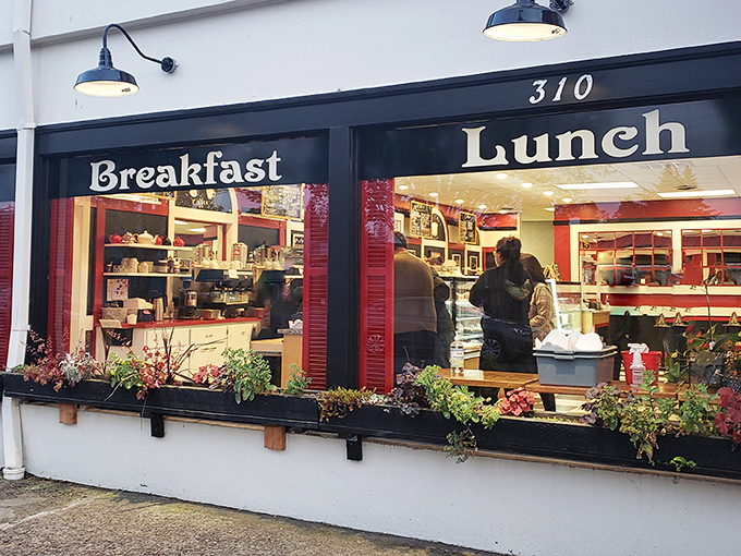 The charming red and white exterior of Gerry Frank's Konditorei stands like a European postcard in the heart of Salem, complete with a chef statue standing guard.