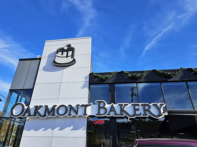 Oakmont Bakery's sleek, modern exterior stands like a temple to carbohydrates, complete with outdoor seating for those who can't wait to dive into their treasures.
