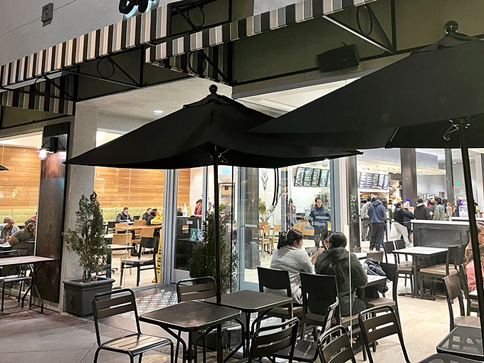 Porto's outdoor seating area offers the perfect stage for people-watching while debating which pastry deserves your undivided attention next.