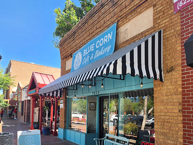 The charming turquoise storefront with its classic black-and-white striped awning stands out like a culinary oasis in historic downtown Glendale.