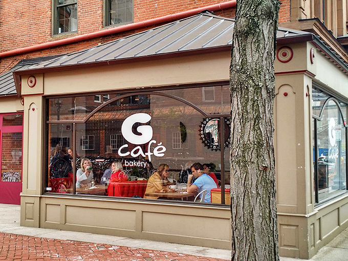 The storefront beckons like an old friend, with its tan facade and large windows offering glimpses of culinary happiness within. New Haven's brick sidewalks lead right to deliciousness.