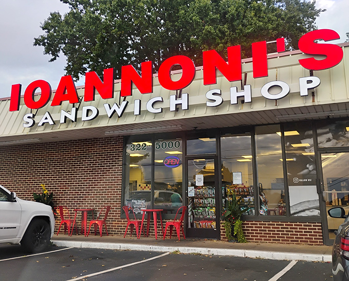 The bold red letters of Ioannoni's beckon like a siren song to sandwich enthusiasts &ndash; no fancy frills, just the silent promise of deliciousness waiting inside.
