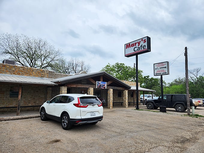 The unassuming exterior of Mary's Cafe stands proudly against the Texas sky &ndash; proof that culinary greatness often comes in humble packages.