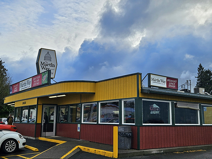 The unassuming exterior of Martin Way Diner stands like a beacon in the Washington rain, promising comfort food salvation to hungry travelers.