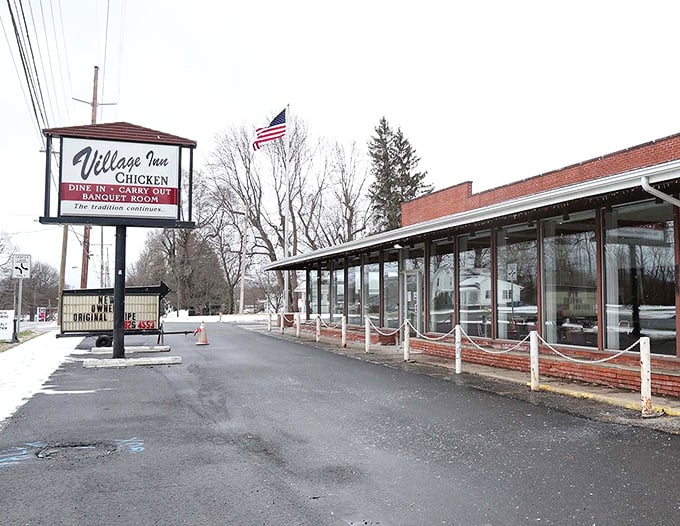 The unassuming exterior of Milich's Village Inn Chicken stands as a beacon to fried chicken aficionados, promising delicious simplicity rather than flashy gimmicks.
