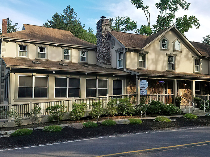 The stately exterior of The Frogtown Chophouse stands like a welcoming country manor, promising culinary treasures within its cream-colored walls.