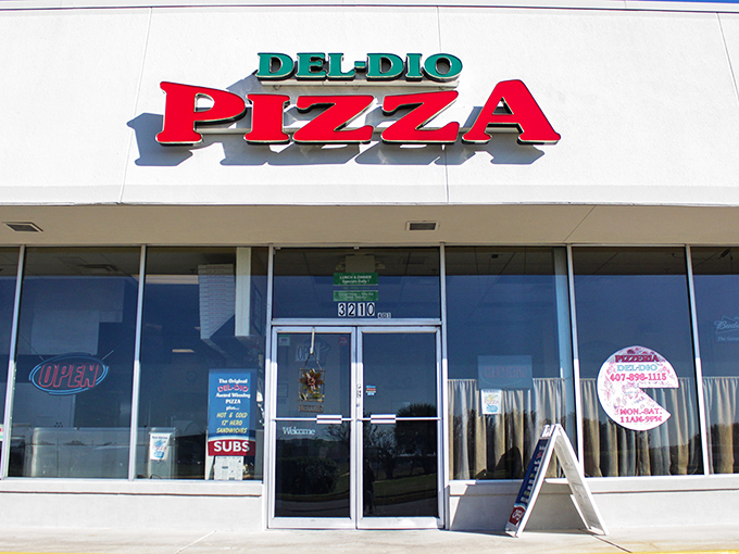 The unassuming storefront that houses pizza greatness. Like Clark Kent's glasses, this modest exterior conceals superhero-level Italian food inside.