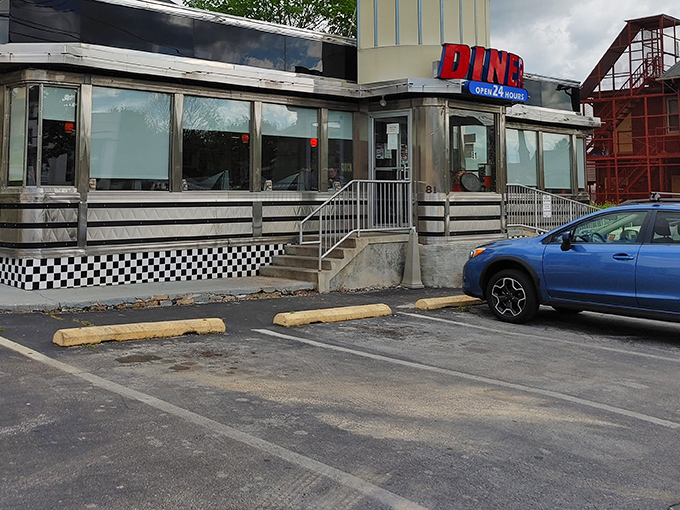 The classic stainless steel exterior with its vintage "OPEN" sign isn't just inviting&mdash;it's practically a time portal to simpler days.