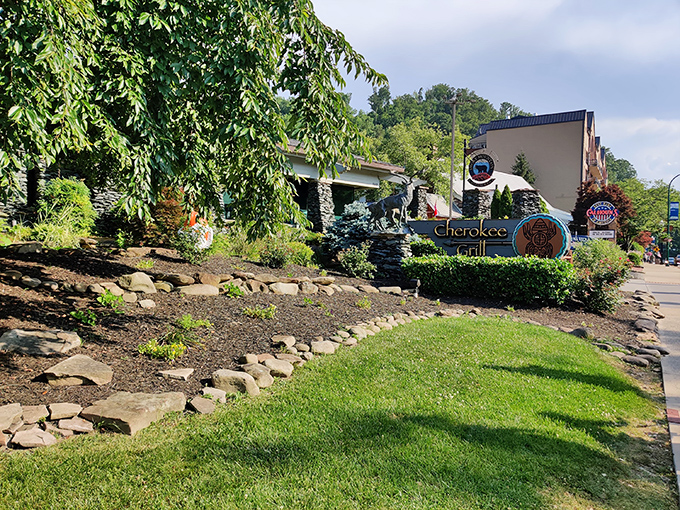 Stone pillars that mean business! Cherokee Grill's rustic mountain lodge exterior promises what every hungry traveler hopes for—authenticity with a side of comfort.