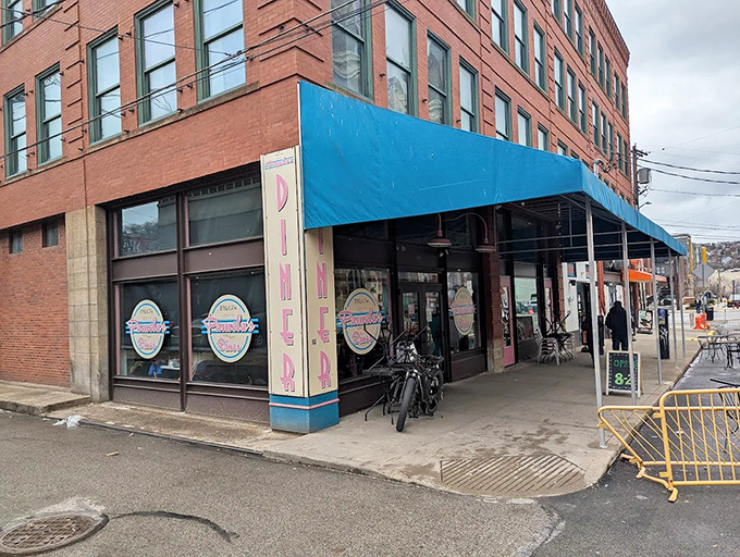 The line outside Pamela's isn't a bug, it's a feature. That turquoise awning signals breakfast nirvana awaits those patient enough to queue.