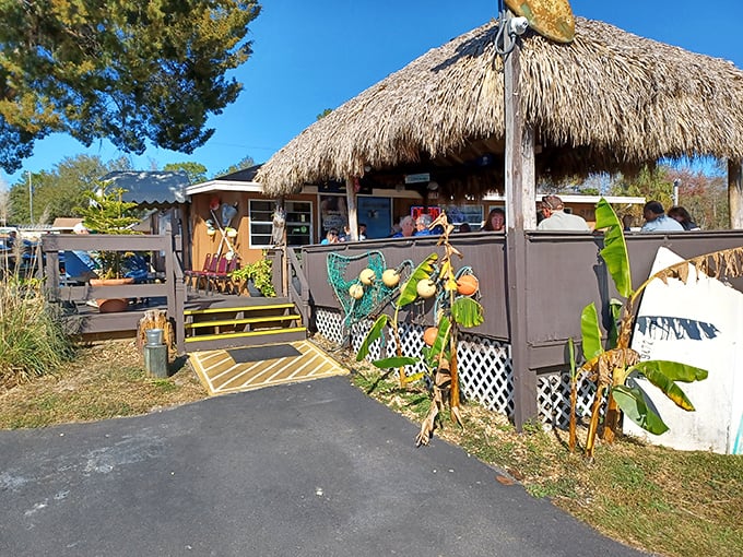 The unassuming exterior of Dan's Clam Stand proves once again that in Florida, the most magical seafood experiences often hide behind the simplest facades.