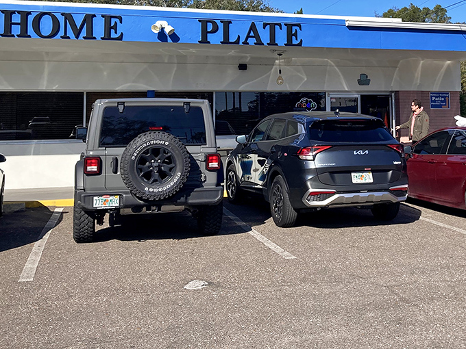 The blue sign beckons like a lighthouse for the breakfast-deprived. Home Plate's modest exterior hides culinary treasures that locals line up for.