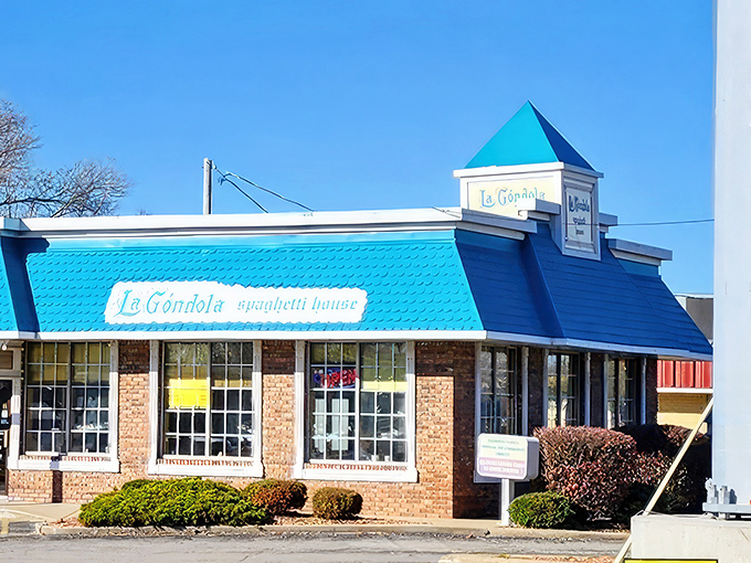 That distinct turquoise roof isn't just eye-catching&mdash;it's a beacon for pasta pilgrims. La Gondola's humble exterior hides culinary treasures worth discovering.
