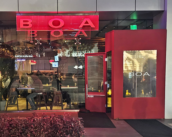 The iconic red exterior of BOA Steakhouse glows like a beacon on Sunset Boulevard, promising carnivorous delights within these stylish walls.