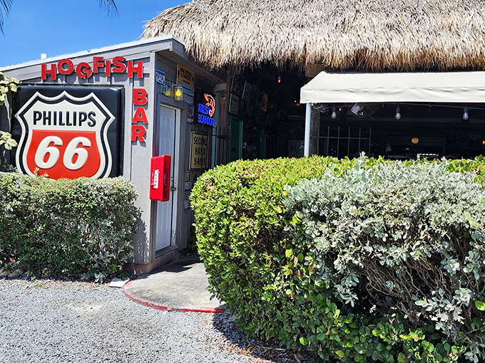 The iconic Phillips 66 sign and thatched roof welcome you to Hogfish Bar & Grill&mdash;proof that Florida's best treasures aren't always hiding in plain sight.