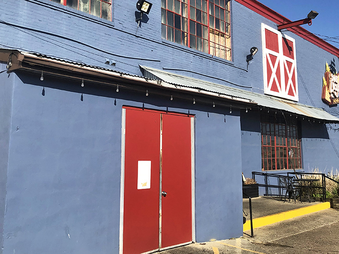 The bright blue barn-like exterior of Sweet Lucy's stands out like a barbecue beacon in Northeast Philly. The red accents practically scream "good things are smoking inside!"