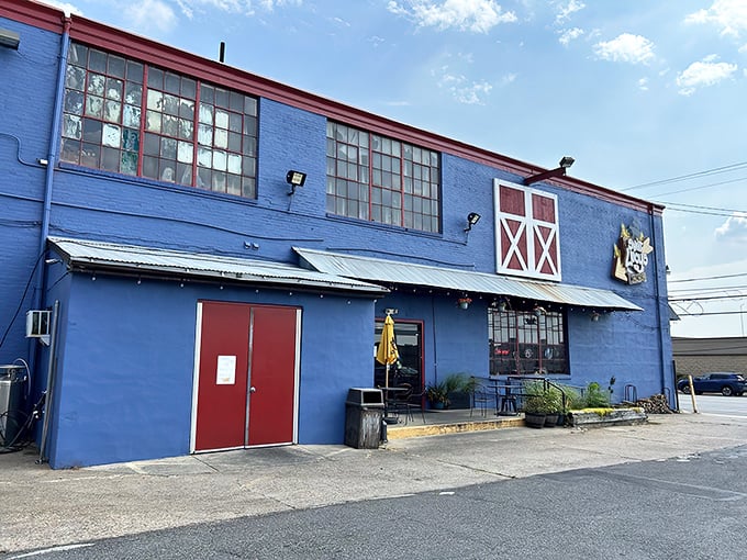 The unassuming blue exterior with barn-red accents is like a barbecue speakeasy&mdash;those in the know recognize this humble building houses smoky treasures within.