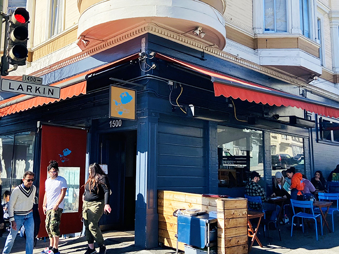 The red awning and line stretching down the block tells you everything &ndash; this isn't just breakfast, it's an event worth waiting for.