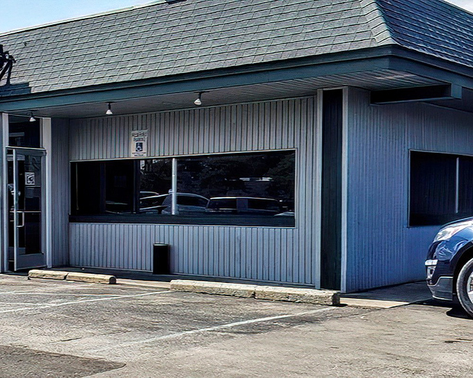 The humble green-roofed exterior of Four Korners Restaurant doesn't scream for attention, but locals know this unassuming spot hides culinary treasures worth discovering.