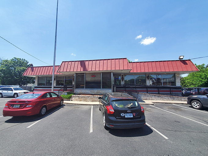The classic red roof of Route 1 Diner stands like a beacon for hungry travelers, complete with American flag proudly waving &ndash; a true Jersey roadside landmark.