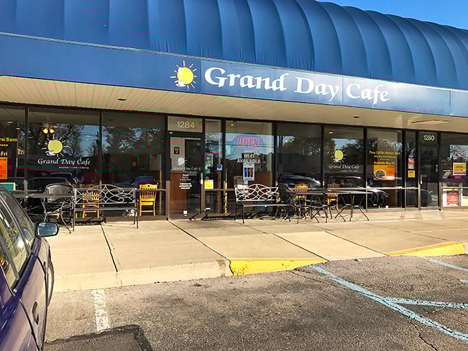 Like a beacon of breakfast hope, Grand Day Cafe's blue awning signals salvation for hungry Columbus locals seeking their morning hash brown fix.