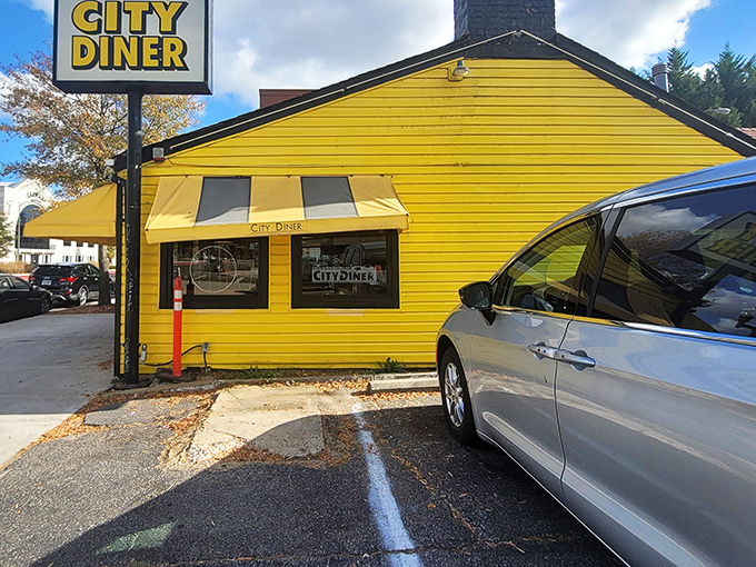 The cheerful yellow exterior of City Diner stands like a beacon of breakfast hope on Richmond's Cary Street.