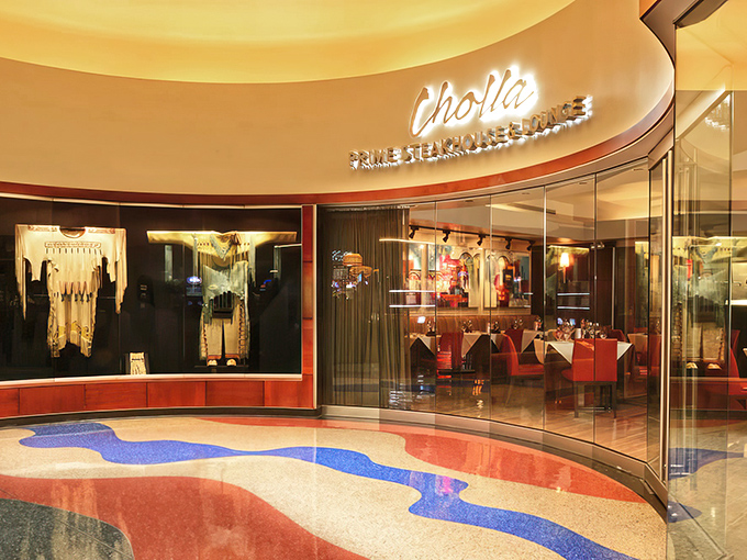 The sleek entrance to Cholla beckons like a culinary oasis in the desert, promising treasures that go far beyond its understated exterior.