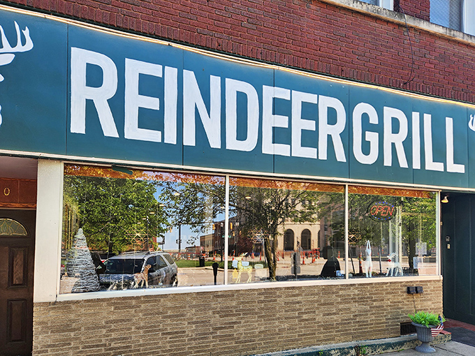 The unassuming brick facade of Reindeer Grill in Mansfield hides culinary treasures within. That iconic green sign with the deer silhouette has become a beacon for steak lovers.
