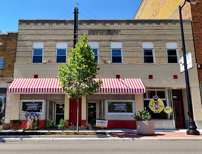 The candy-striped awnings of Grandpa Joe's beckon like a sweet siren call to downtown Middletown, promising sugary treasures within these historic brick walls.