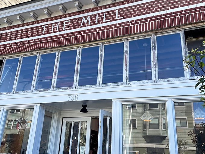 That brick facade with those gorgeous industrial windows? Pure San Francisco charm meets serious breakfast business. 