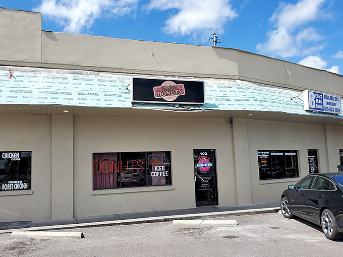The unassuming exterior of Nicola's Donuts proves once again that culinary treasures often hide in plain sight, like Tampa's answer to Clark Kent.