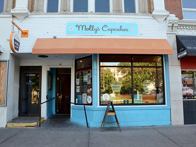 The blue and orange storefront of Molly's Cupcakes stands out on Iowa City's Washington Street like a dessert oasis in a sea of brick buildings.
