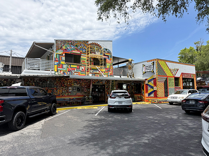 The vibrant exterior looks like what would happen if Willy Wonka opened a pizza joint in Florida instead of a chocolate factory.