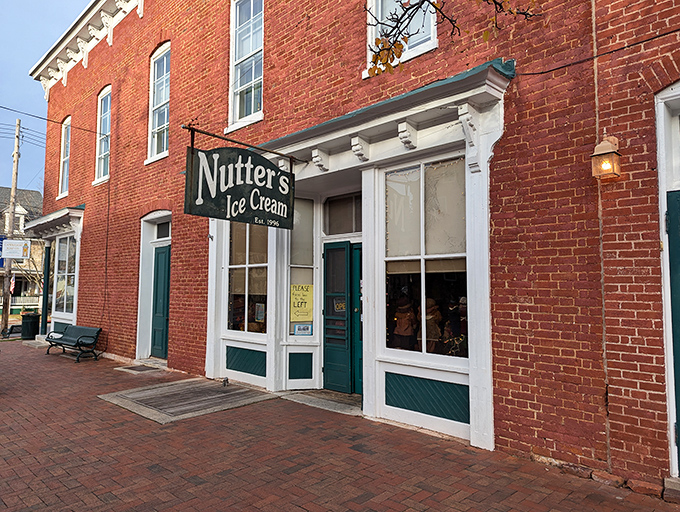 The historic red brick fa&ccedil;ade of Nutter's Ice Cream stands like a sweet sentinel in downtown Sharpsburg, promising cold comfort since 1996.