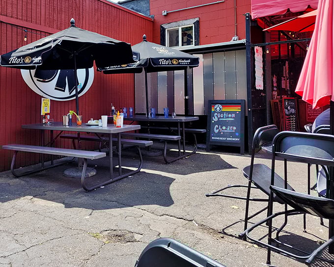 The unassuming red brick exterior of DK Diner hides culinary treasures within. Those picnic tables have witnessed countless breakfast epiphanies.