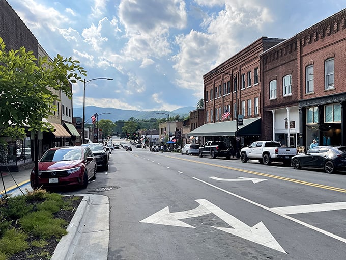 Main Street Brevard stretches before you like a welcoming committee, with the Blue Ridge Mountains playing backdrop like they're auditioning for a postcard. 