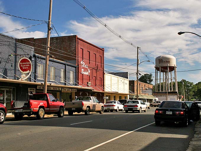 Minden's iconic water tower stands sentinel over brick-lined streets that whisper stories of Louisiana's past. Small-town charm with big personality.