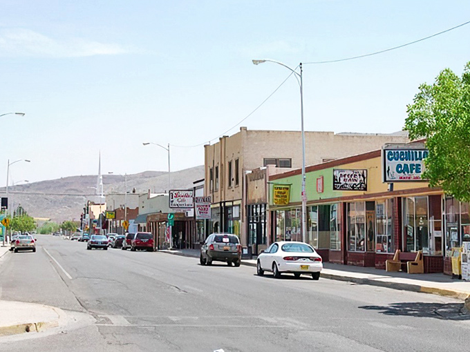 Main Street charm on full display with that impossibly blue New Mexico sky. Small-town America with a quirky twist and mountains as the backdrop.