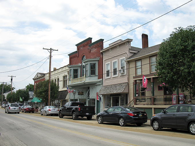 American flags flutter proudly along Waynesville's Main Street, where historic homes stand like sentinels of a more gracious era. Norman Rockwell couldn't have painted it better.