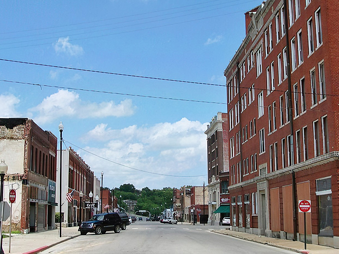 Downtown Pawhuska's historic brick buildings stand like sentinels of another era, their weathered facades telling stories of boom times, quiet decades, and remarkable revival.