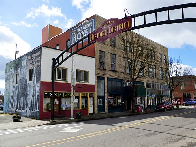 The historic Cottage Grove Hotel sign stands sentinel over Main Street, a reminder that some of the best small-town treasures don't need neon to shine.