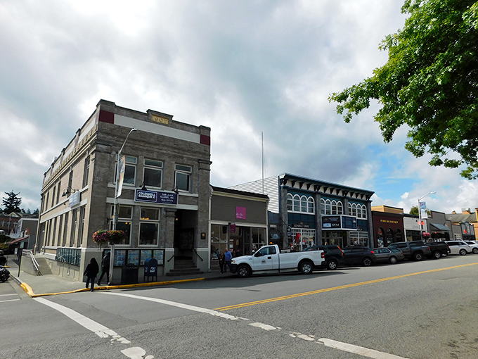 Spring Street stretches before you like a Norman Rockwell painting come to life, where island pace replaces mainland rush and every storefront tells a story.