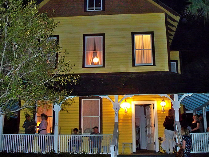 The golden glow of the Riddle House at night creates an atmosphere Stephen King would approve of. Victorian charm meets ghostly tales beneath those illuminated windows.