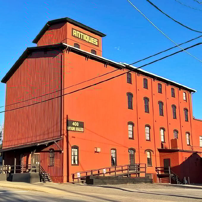 The brilliant vermilion exterior of Roller Mills Marketplace isn't just eye-catching&mdash;it's practically screaming "treasure inside!" like a four-story siren call to antique lovers.