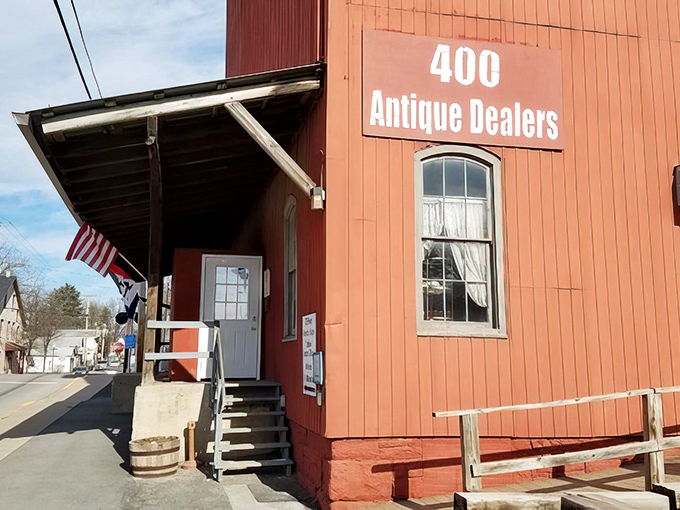 The brilliant vermilion exterior of Roller Mills Marketplace isn't just eye-catching&mdash;it's practically screaming "treasure inside!" like a four-story siren call to antique lovers.
