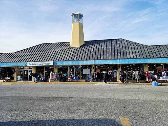 The iconic yellow bell tower of All Saints' Parish Thrift Shop stands like a lighthouse for bargain hunters navigating the sea of retail options in Lewes.