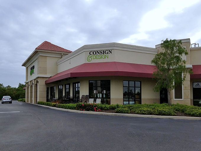 The white stucco exterior with its distinctive striped awnings might not scream "treasure trove," but inside awaits a wonderland of secondhand luxury.