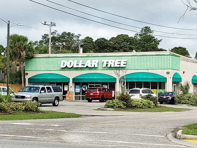 The iconic mint-green facade of Dollar Tree on Kings Highway welcomes bargain hunters with its distinctive awnings and promise of treasures within.